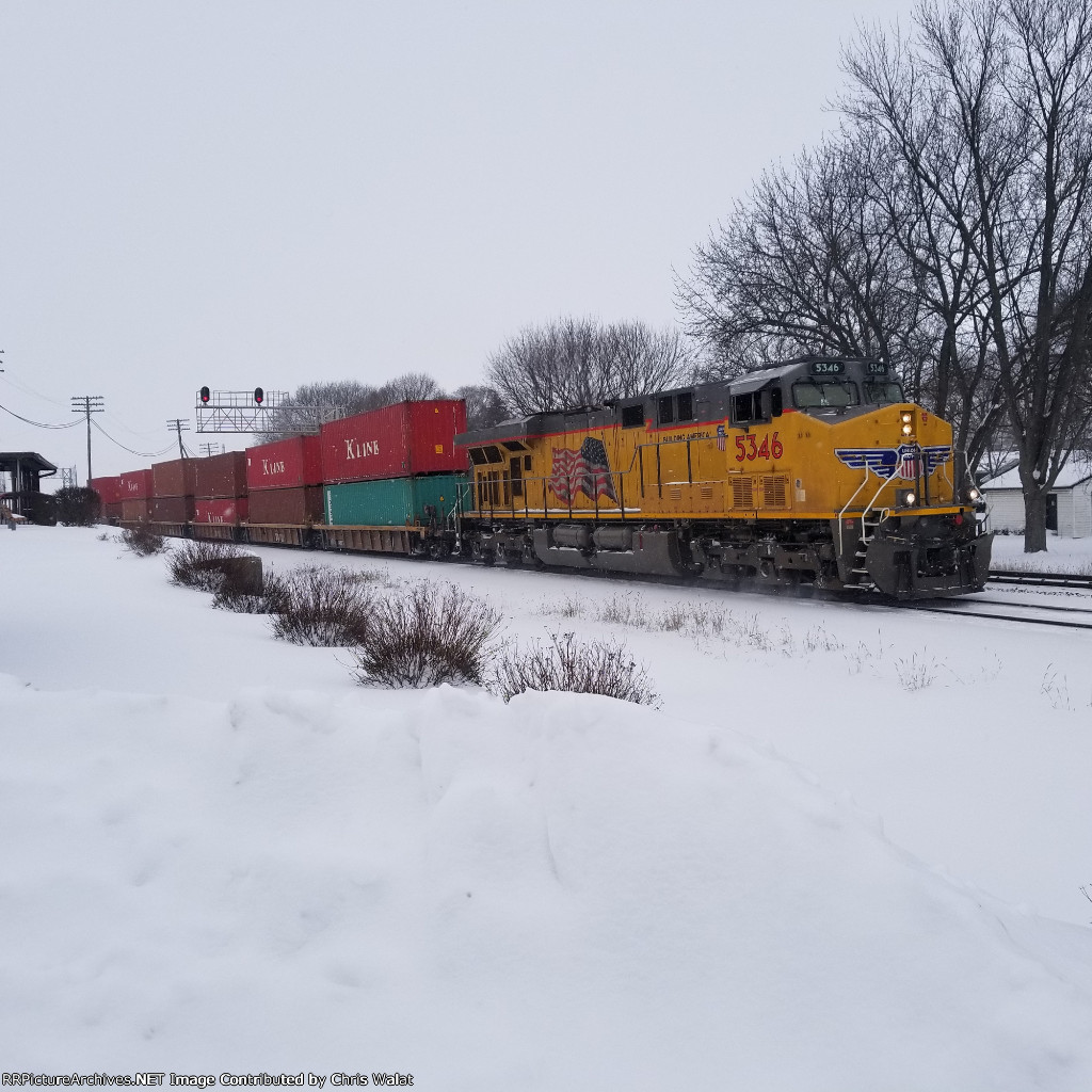UP# 5346 heads a east at Rochelle on a snowy day.